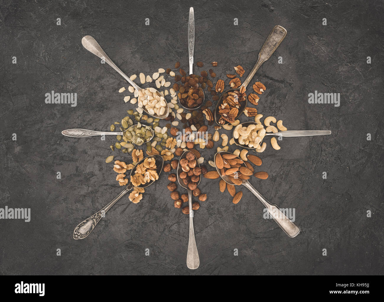 assorted nuts in spoons Stock Photo - Alamy