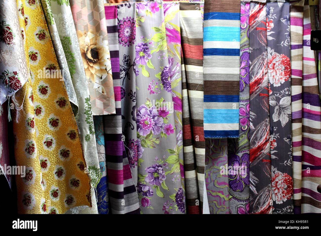 Craft silk material and clothes exhibited on the streets of Fez medina ...