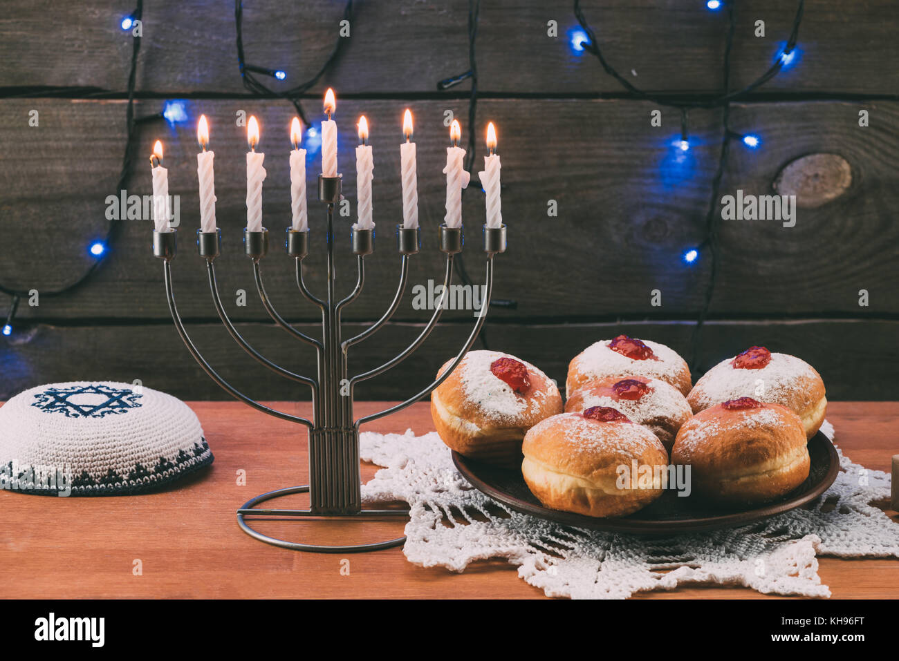 menorah, Kippah and donuts for hanukkah Stock Photo - Alamy