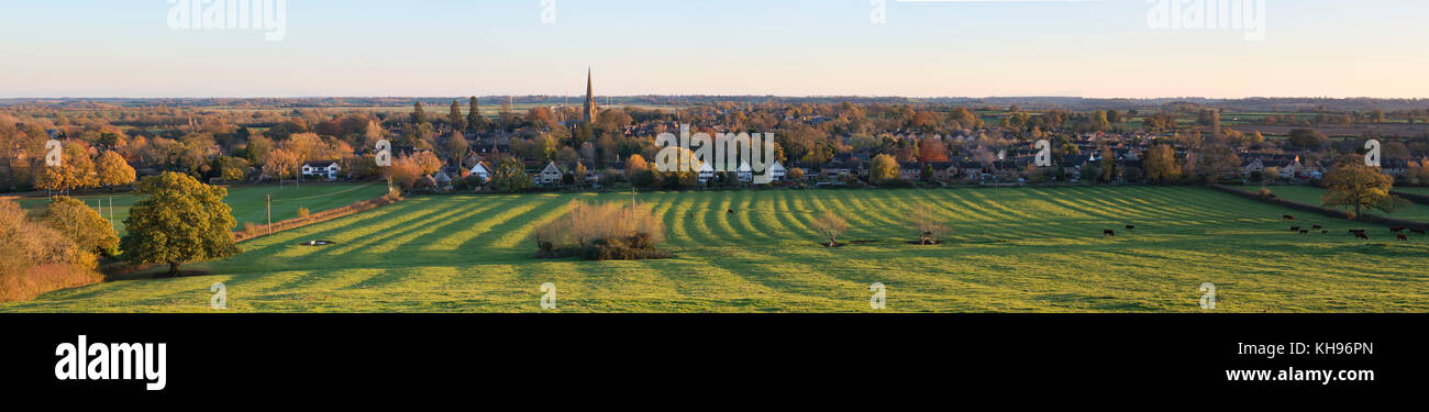 Autumn evening sunlight across the village of Bloxham, Oxfordshire, UK ...