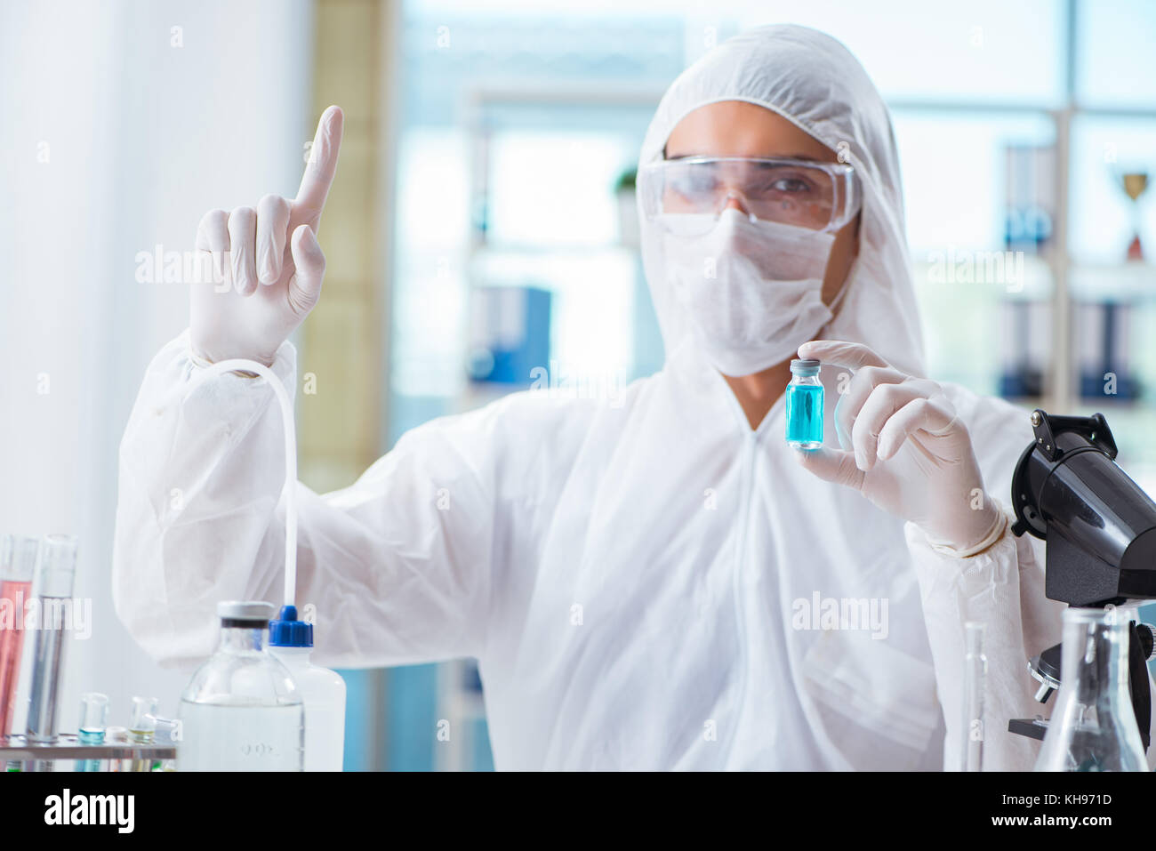 Chemist working in the laboratory with hazardous chemicals Stock Photo ...