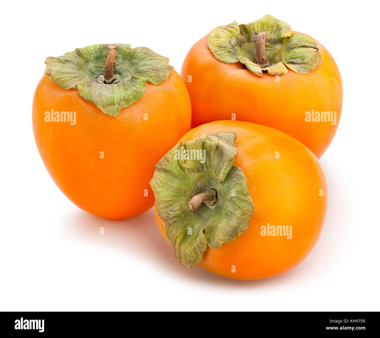 Fresh whole persimmon fruits Cut Out Stock Images & Pictures - Alamy