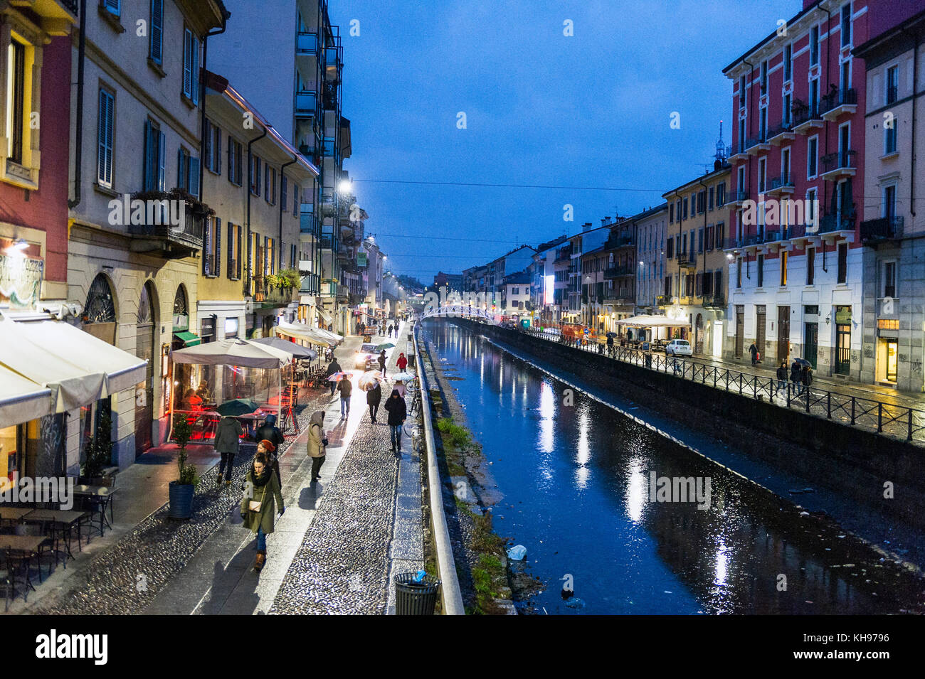Europe. Italy. Lombardy. Milan. People walking at the Navigli by night ...