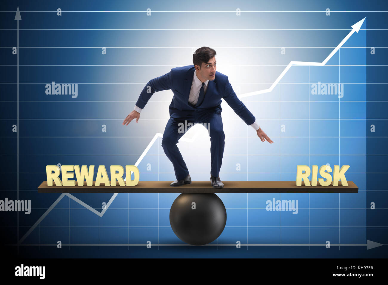 Businessman balancing between reward and risk business concept Stock ...