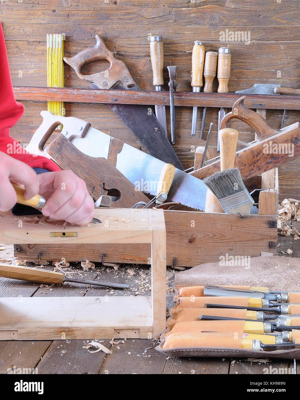 Carpenter working wood on the workbench carpentry Stock Photo - Alamy