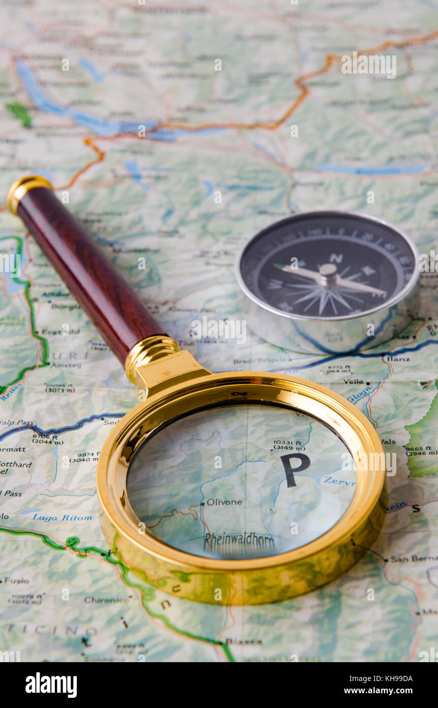 Travel concept with compass and map Stock Photo - Alamy