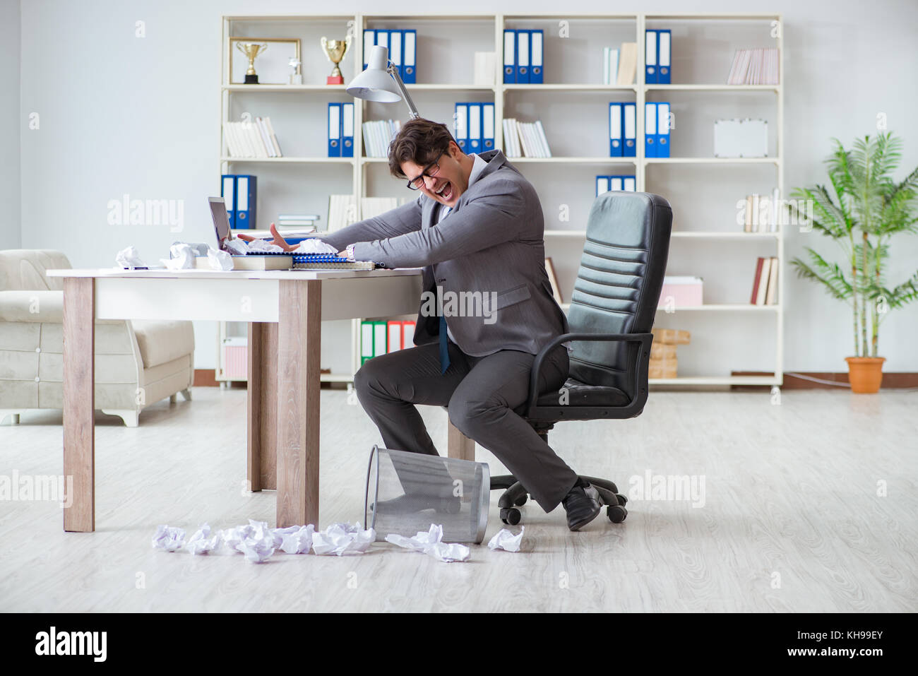 Angry businessman shocked working in the office fired sacked Stock ...