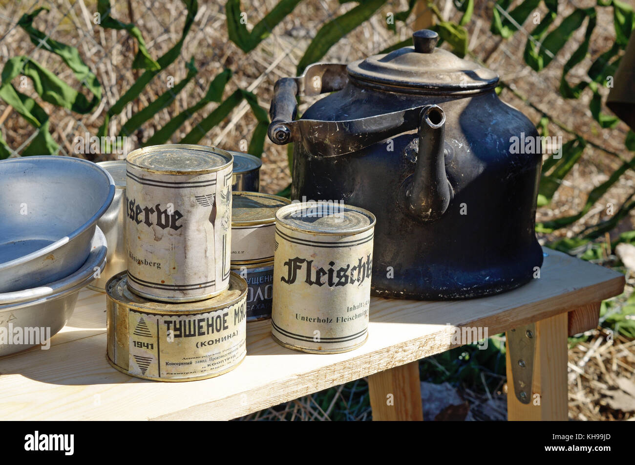On the tableOn the table utensils and canned German and Russian ...