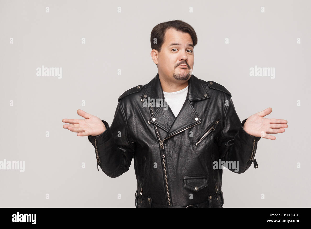 Negative human emotions, facial expressions. Puzzled adult man with ...