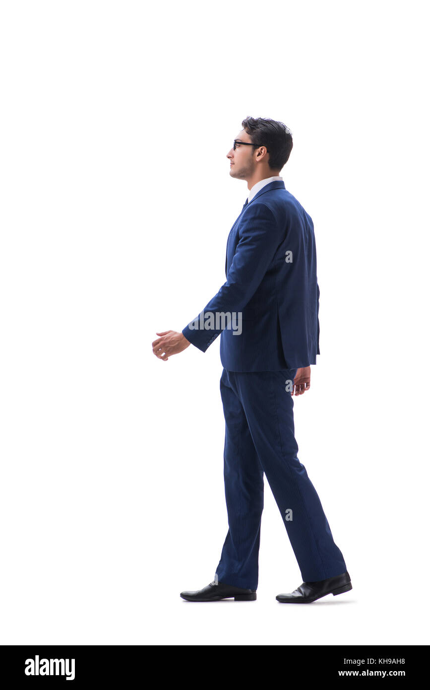 Businessman walking standing side view isolated on white background ...