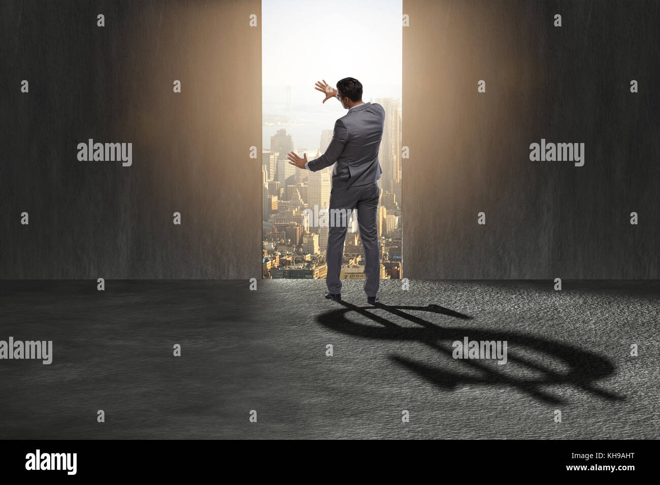 Businessman casting dollar shape shadow in business concept Stock Photo ...