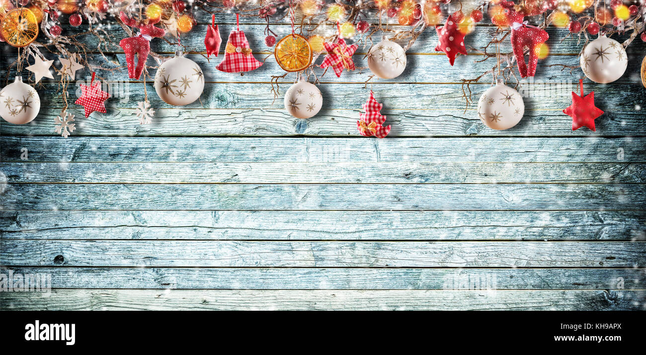 Christmas background with hand made cloth decorations on wooden planks ...