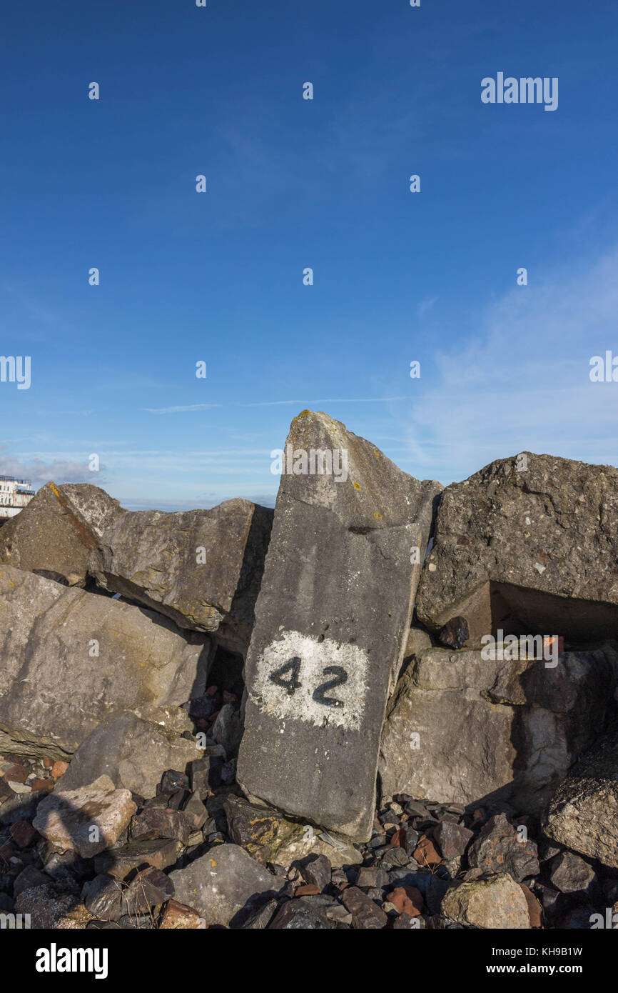 the number 42 painted on white background on large rocks at coast Stock ...