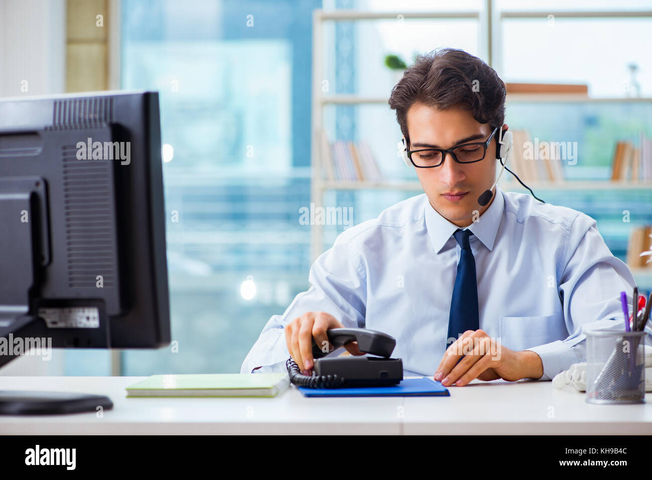 Unhappy angry call center worker frustrated with workload Stock Photo ...