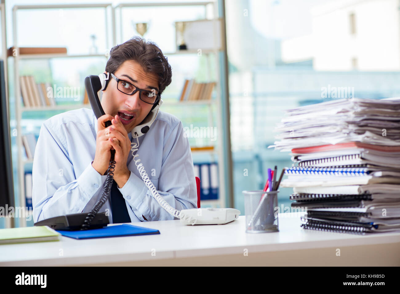 Unhappy angry call center worker frustrated with workload Stock Photo ...