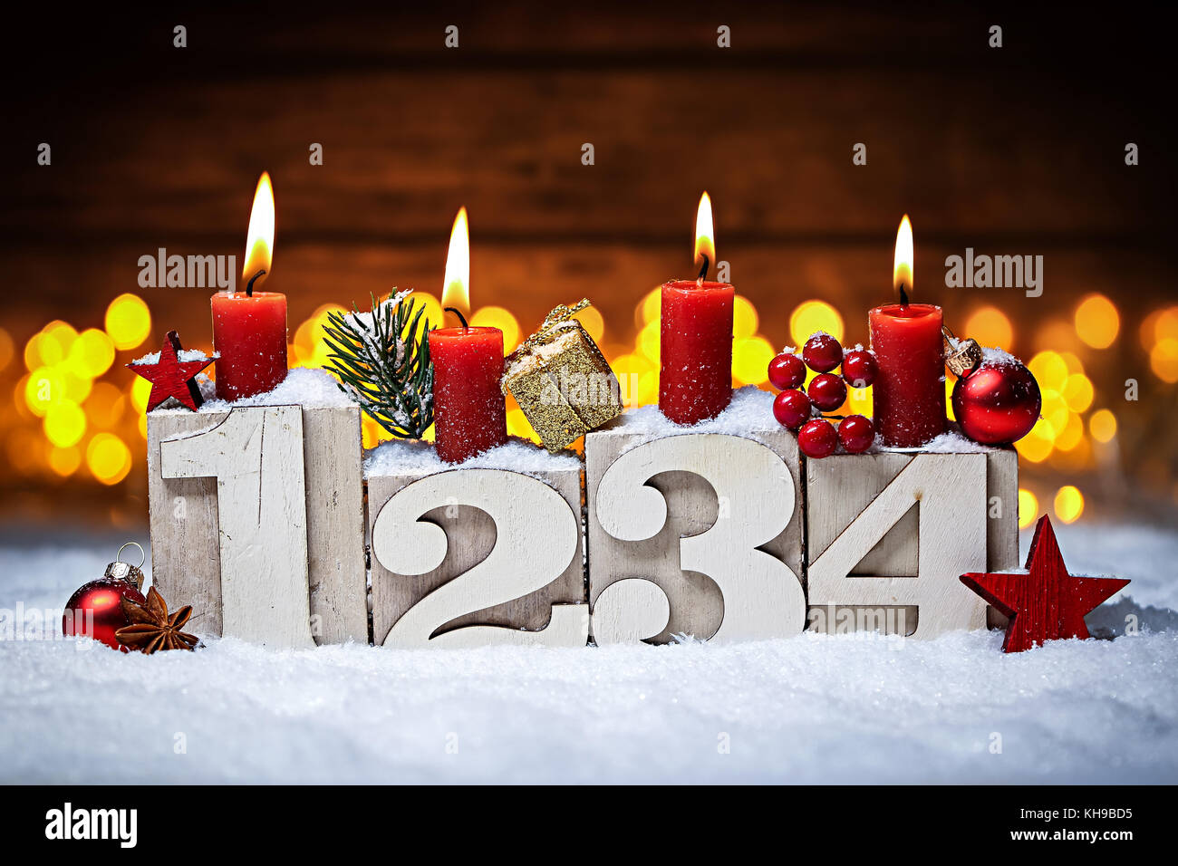 fourth sunday in advent concept xmas light wooden background with ...
