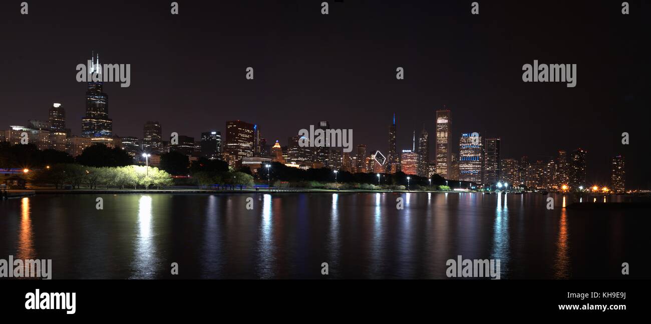 Chicago night skyline across Lake Michigan Stock Photo - Alamy