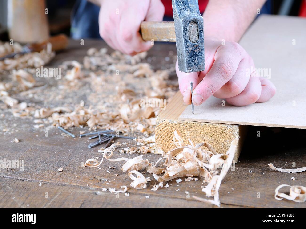 Carpenter working wood on the workbench carpentry Stock Photo - Alamy