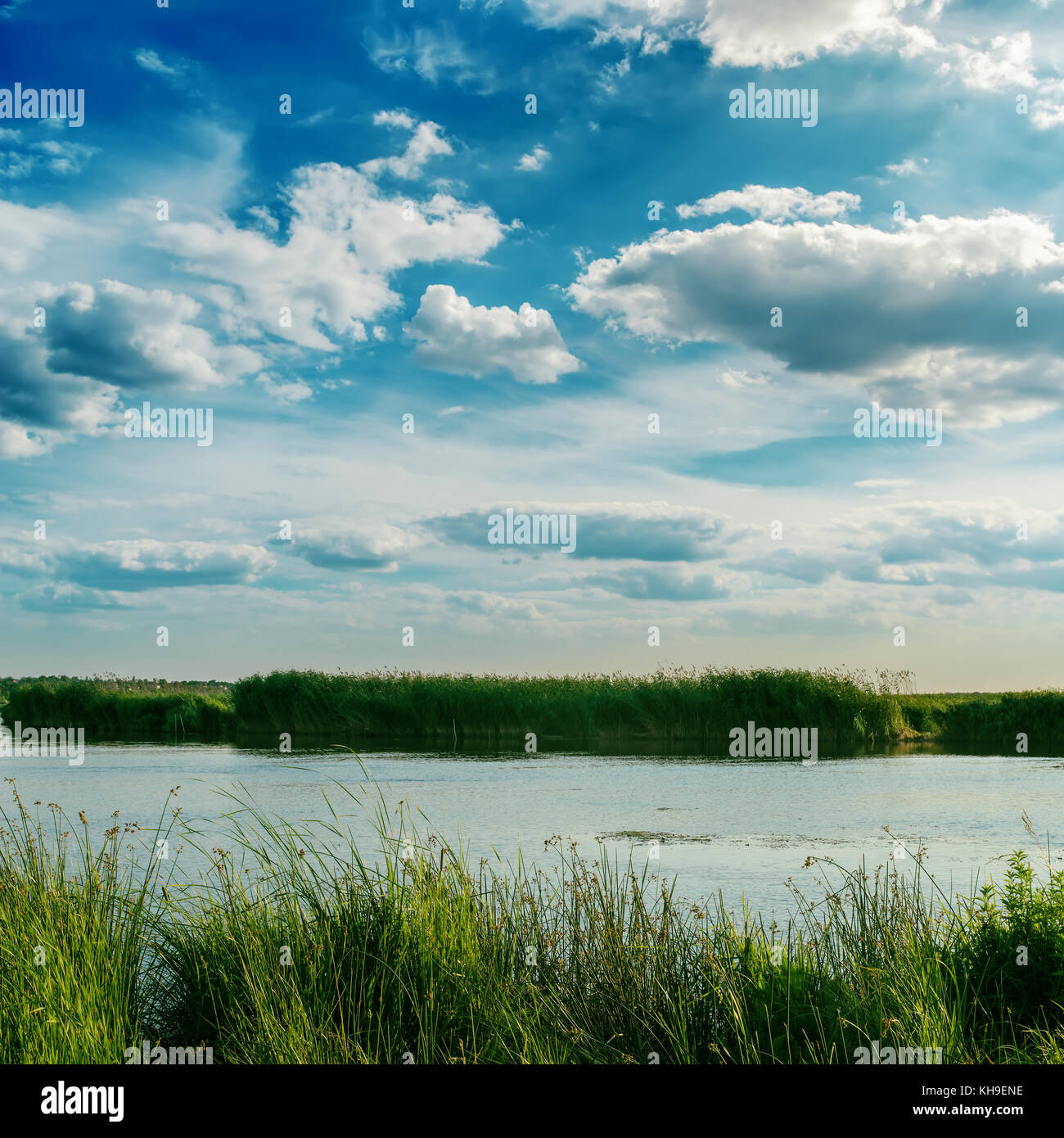 dramatic sky with clouds over river Stock Photo - Alamy