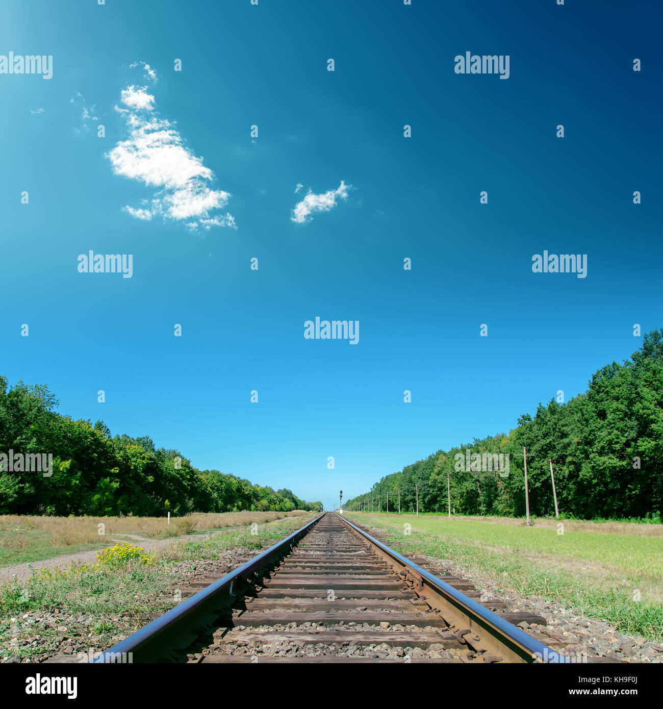 deep blue sky over old railroad Stock Photo - Alamy