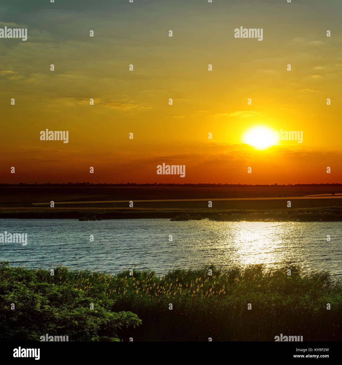 dramatic sunset over river Stock Photo - Alamy