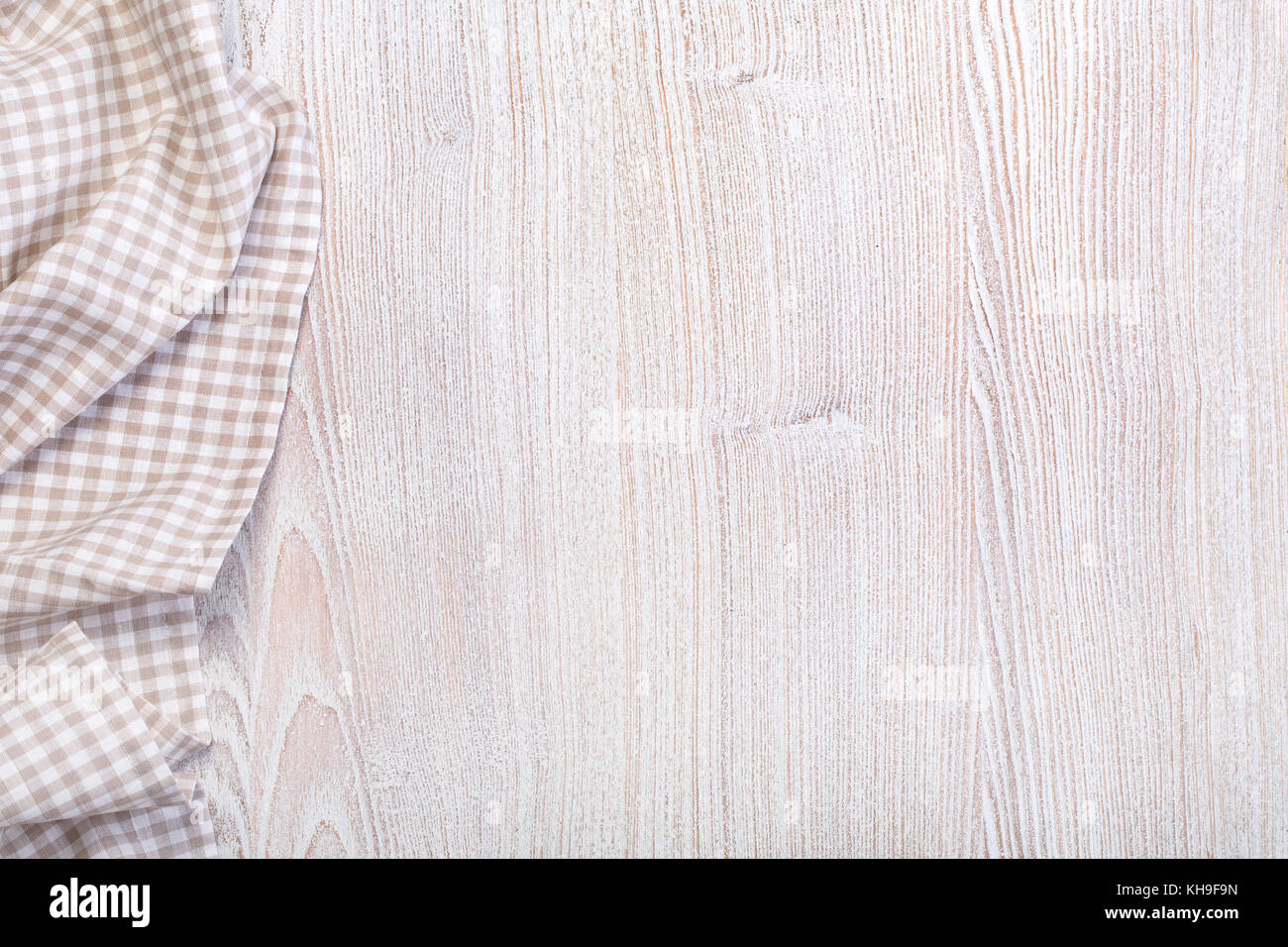 checkered tablecloth on wooden table top view Stock Photo - Alamy