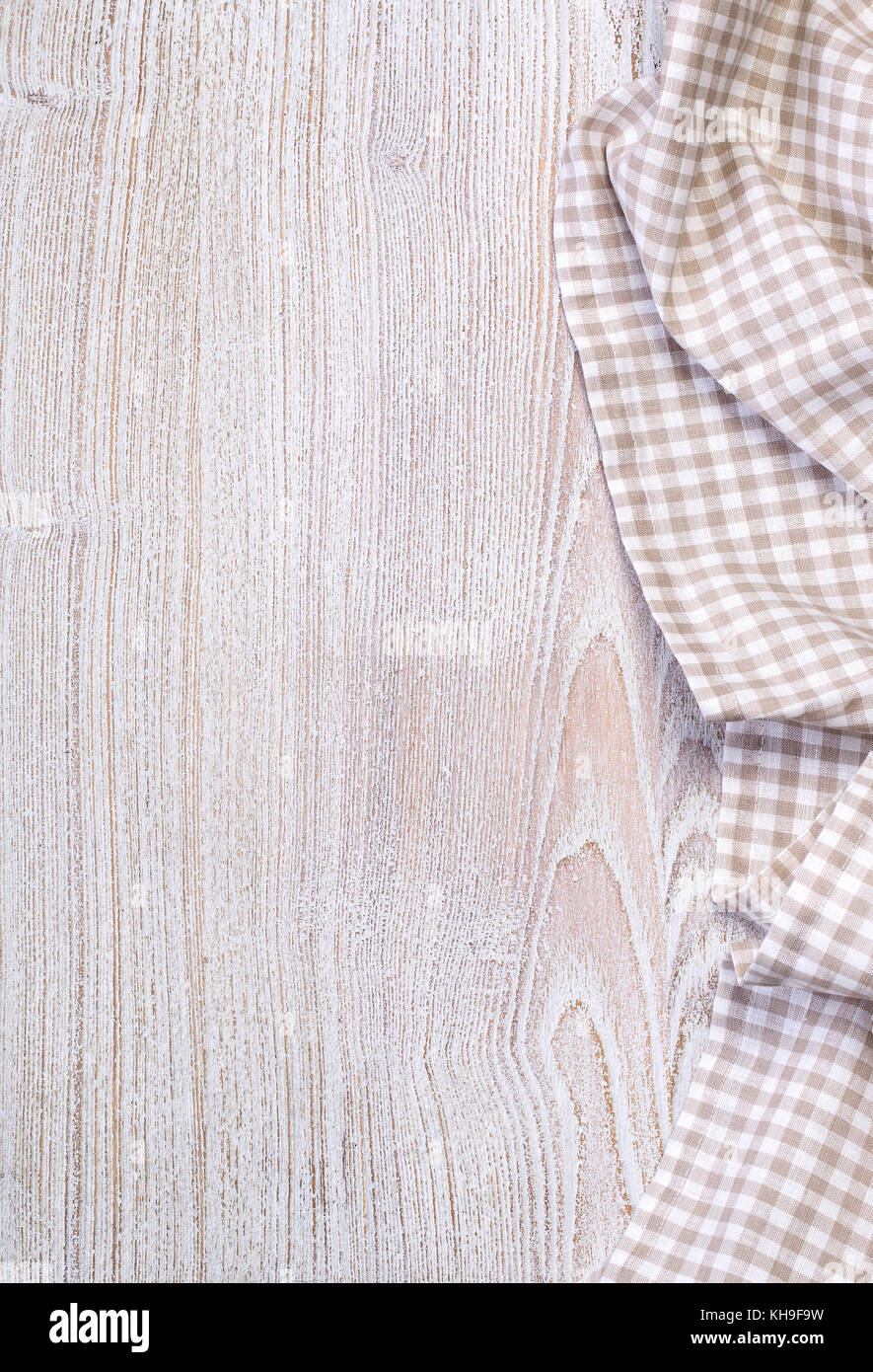 checkered tablecloth on wooden table background Stock Photo - Alamy