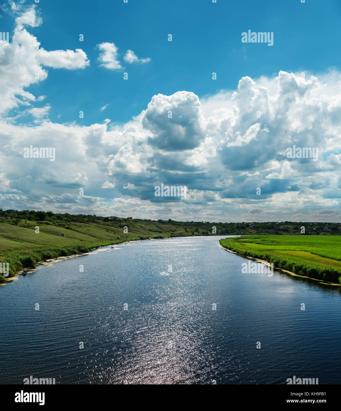 river with reflections of cloudy sky Stock Photo - Alamy