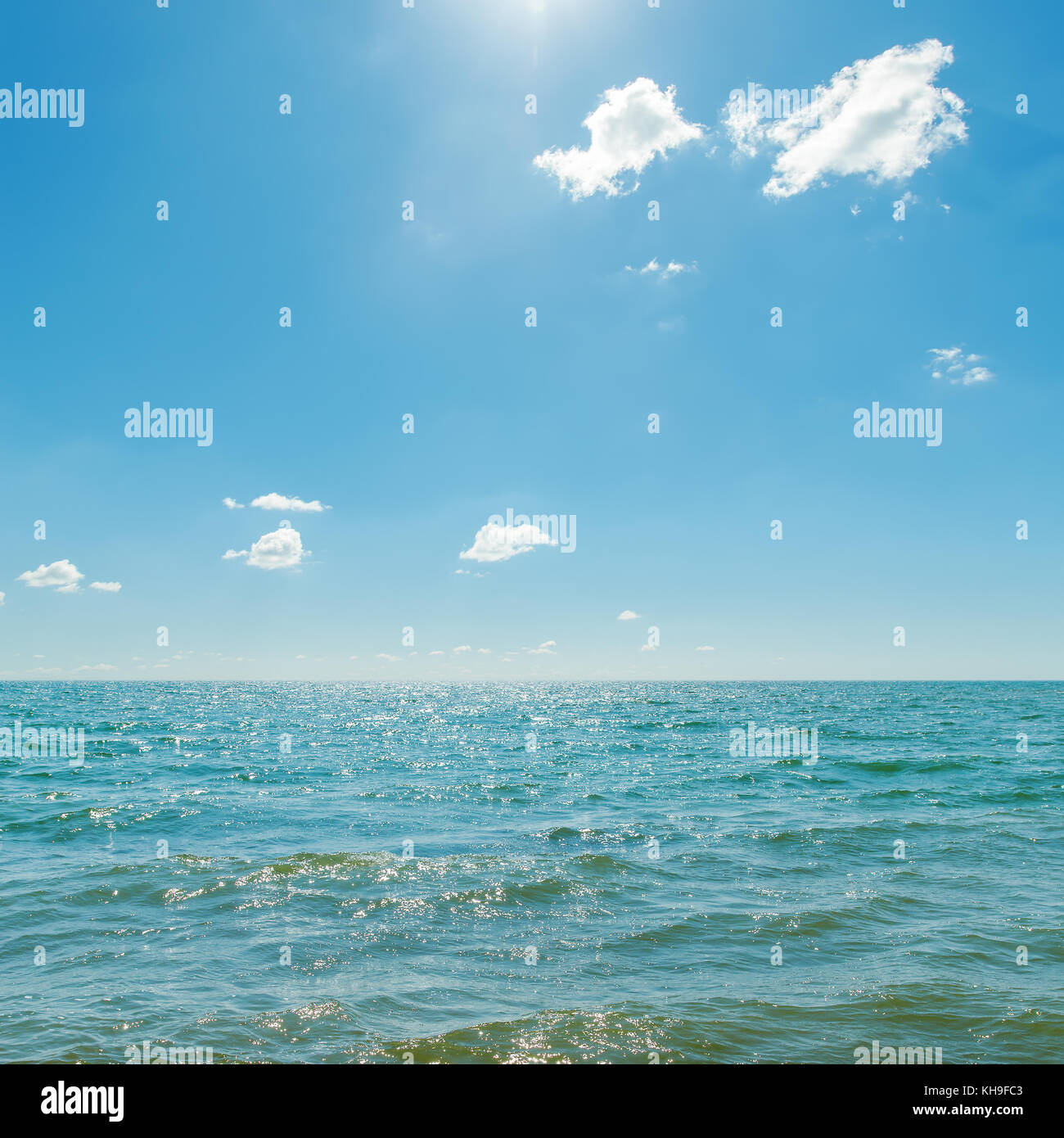 blue sky with sun over sea Stock Photo - Alamy