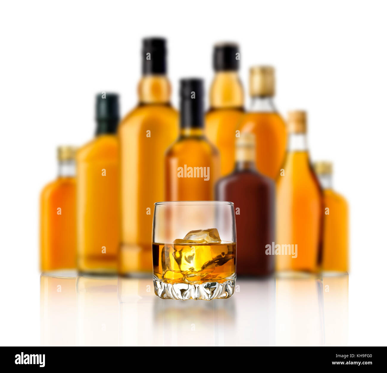 Bottle and glass of whiskey isolated on a white background Stock Photo ...