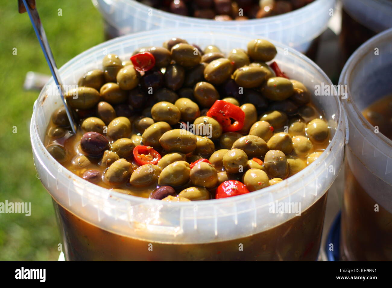 Green Olives on sale at a street market Stock Photo - Alamy
