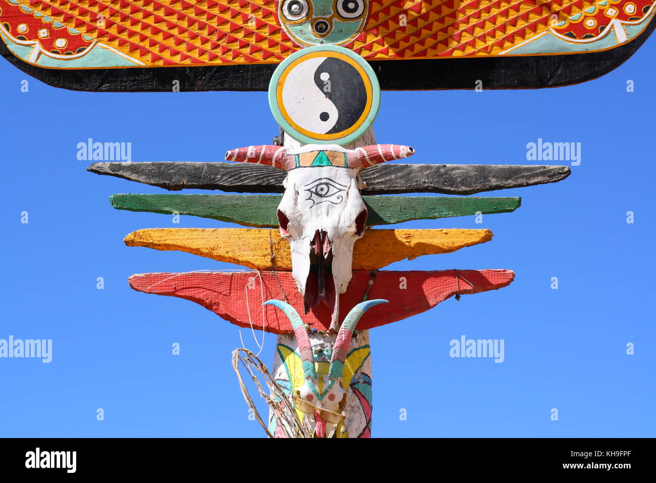 A big skull on a creepy totem column Stock Photo - Alamy