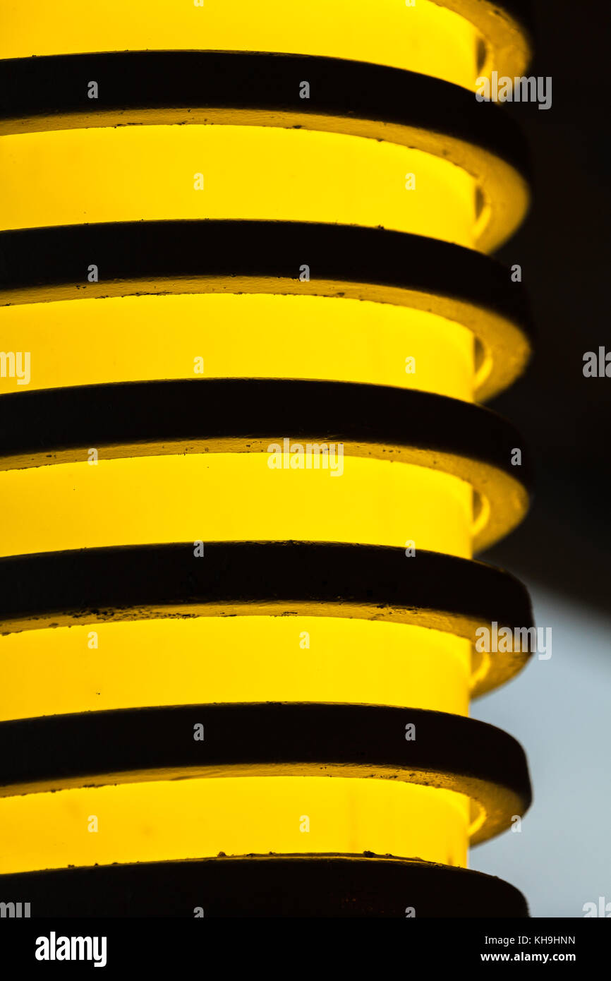 Industrial light with light yellow glass Stock Photo - Alamy