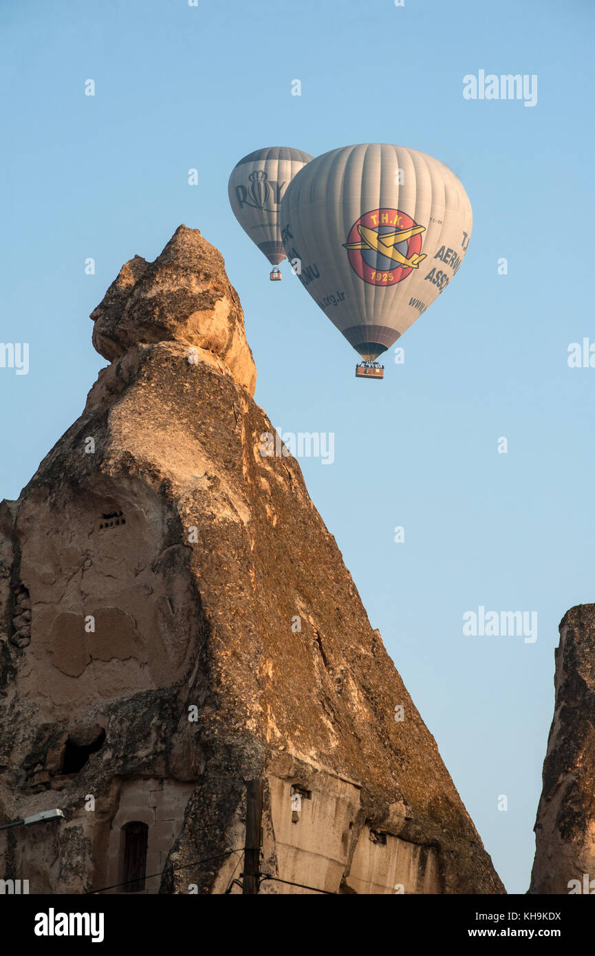 Balloons rise at dawn over Cappadocia Stock Photo - Alamy