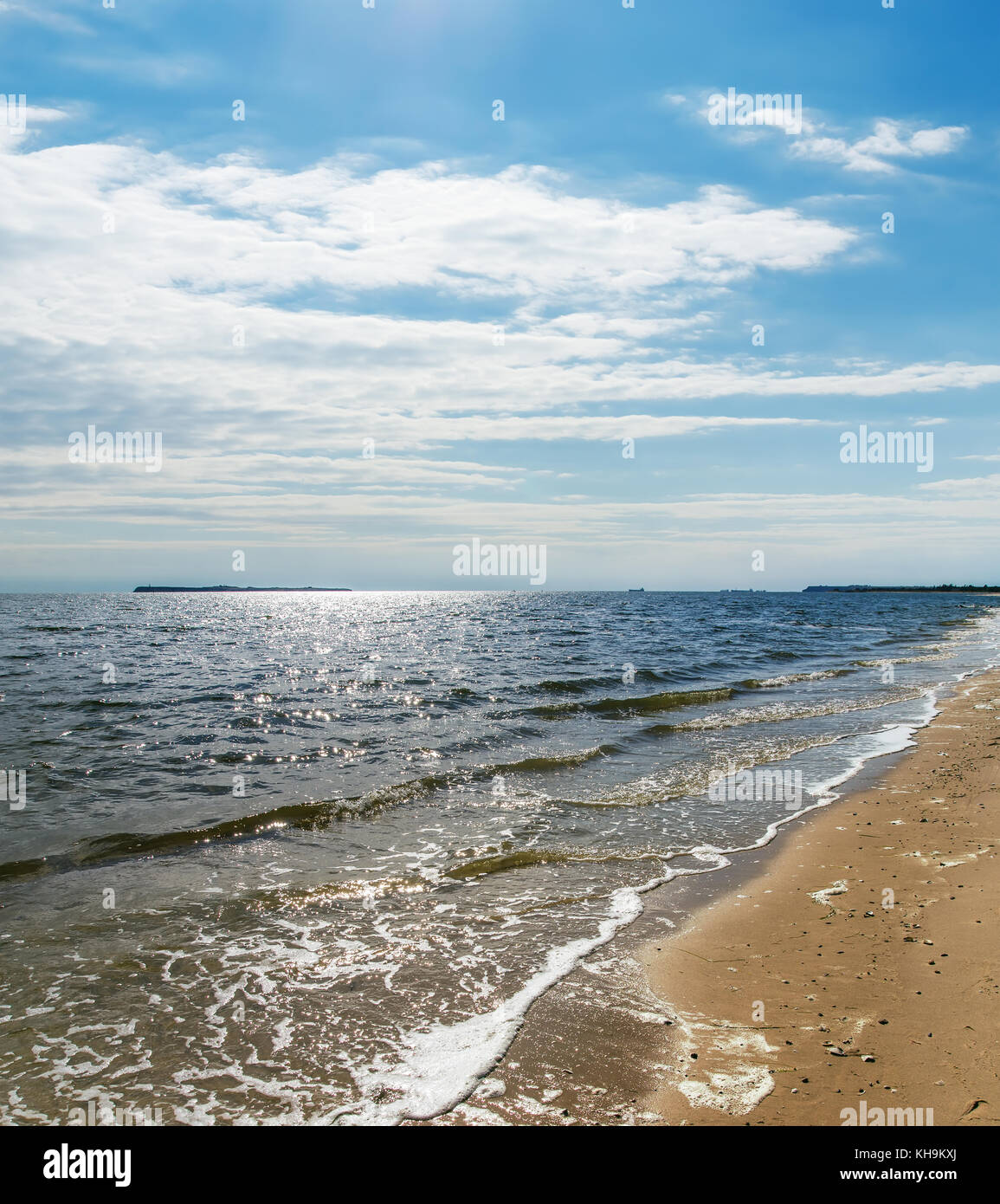 sea in autumn and clouds with sun Stock Photo - Alamy