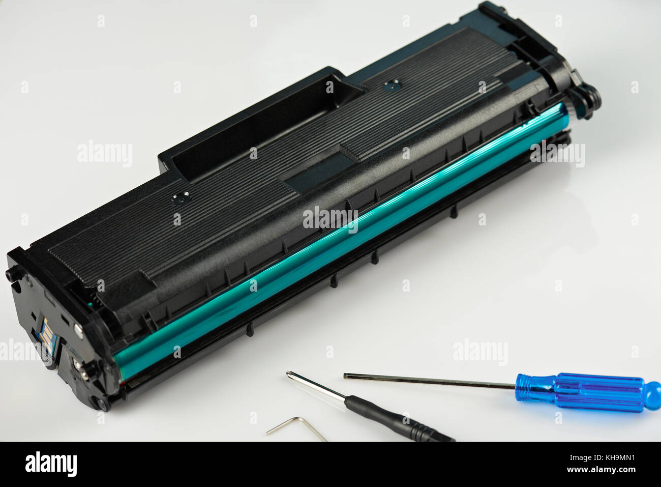Modern printer catridge toner with tools lay on white background Stock ...