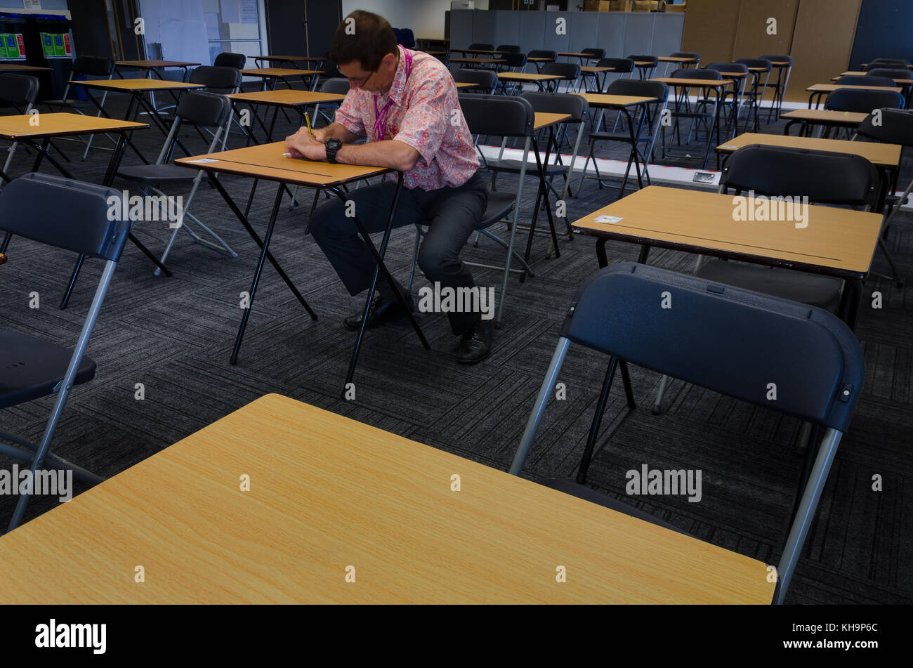 Alone sitting an examination for english and mathematics maths gcse ...