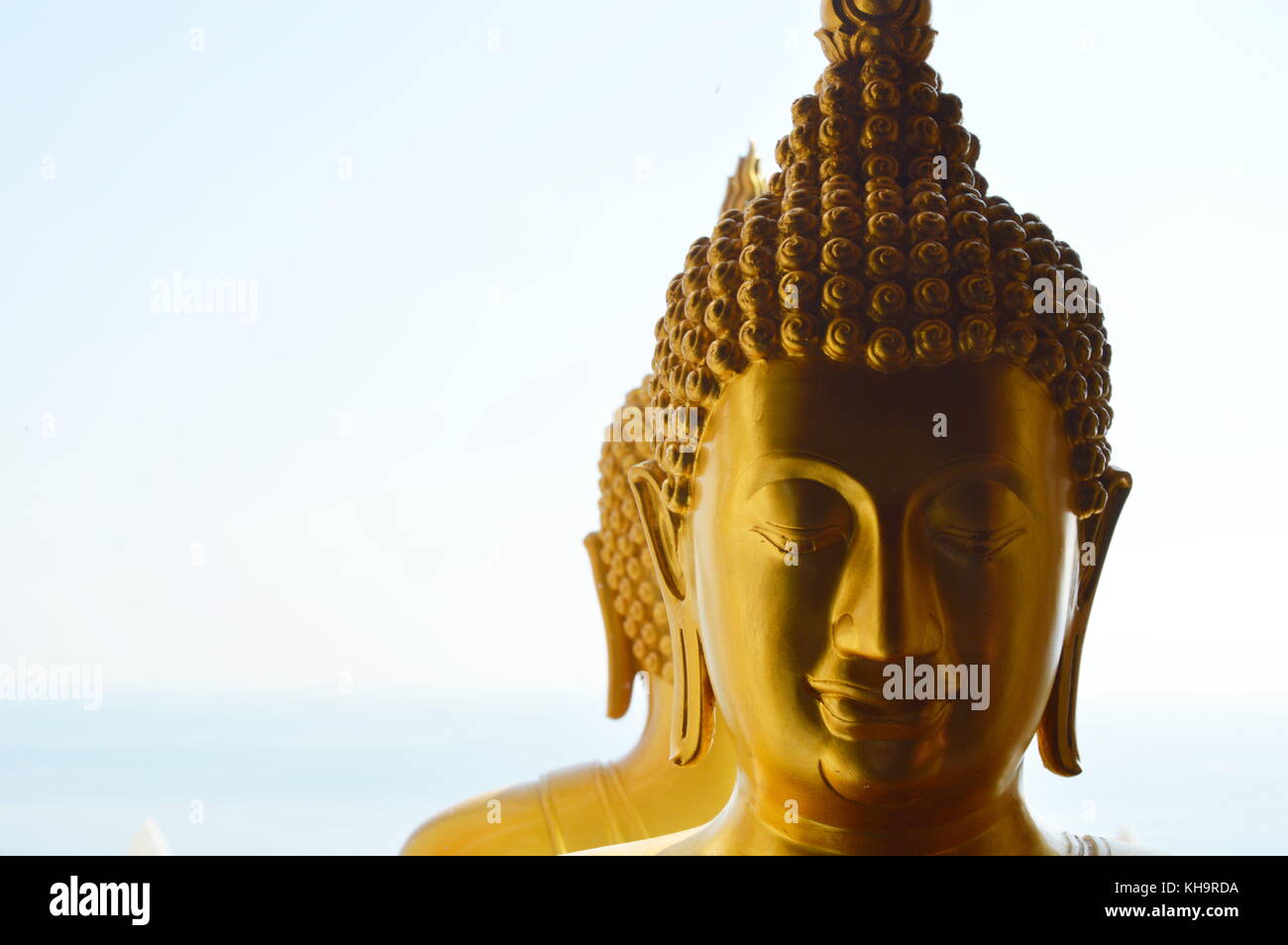 Buddha image and back reflection Stock Photo - Alamy