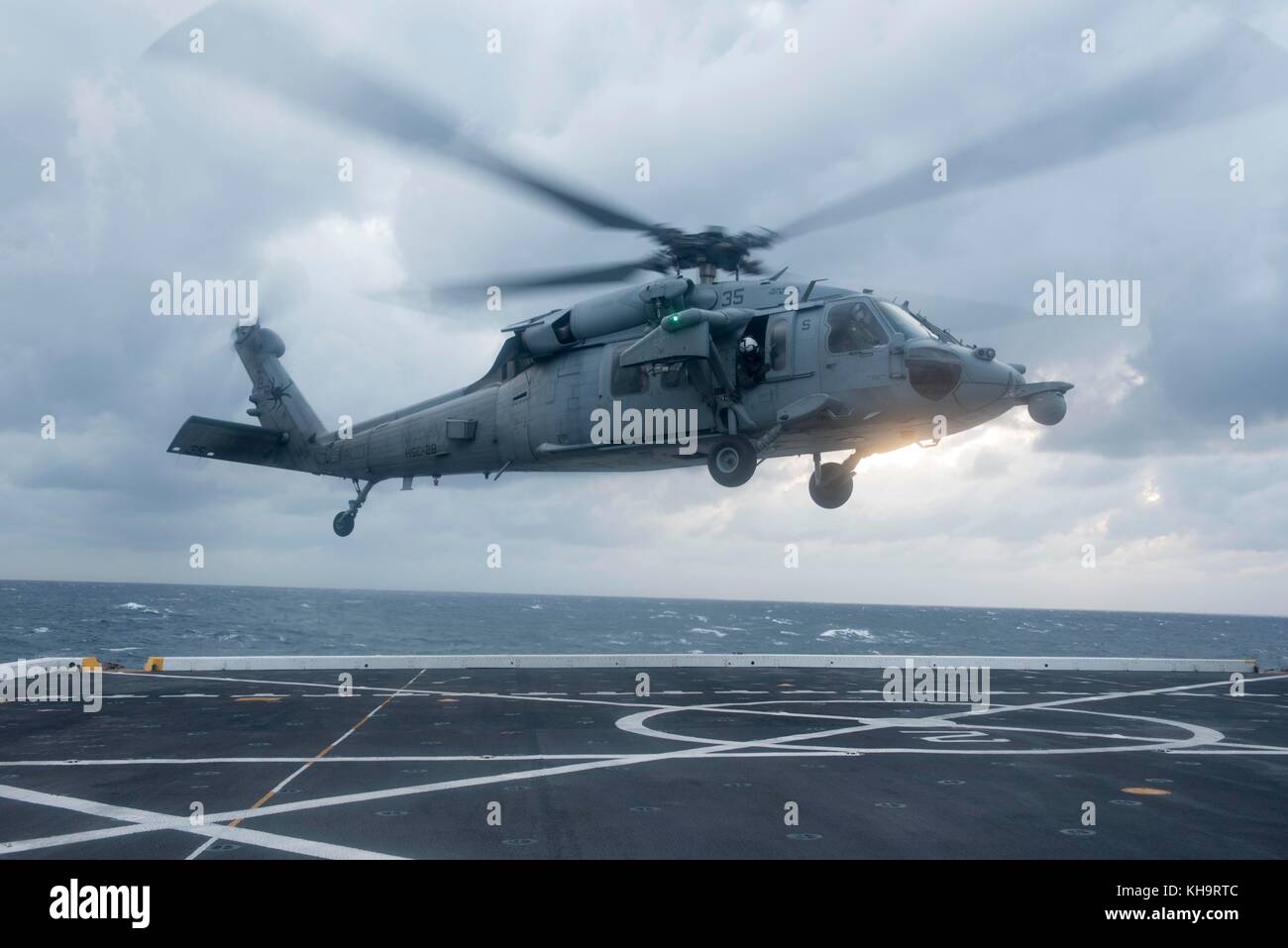 MH-60s, attached to Helicopter Sea Combat Squadron (HSC) 28, lands on ...
