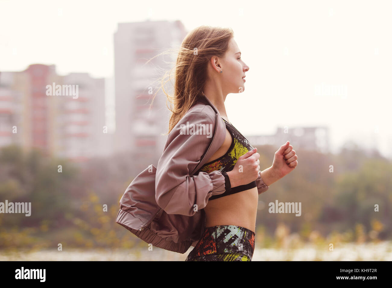 Young woman jogging outdoor hi-res stock photography and images - Alamy