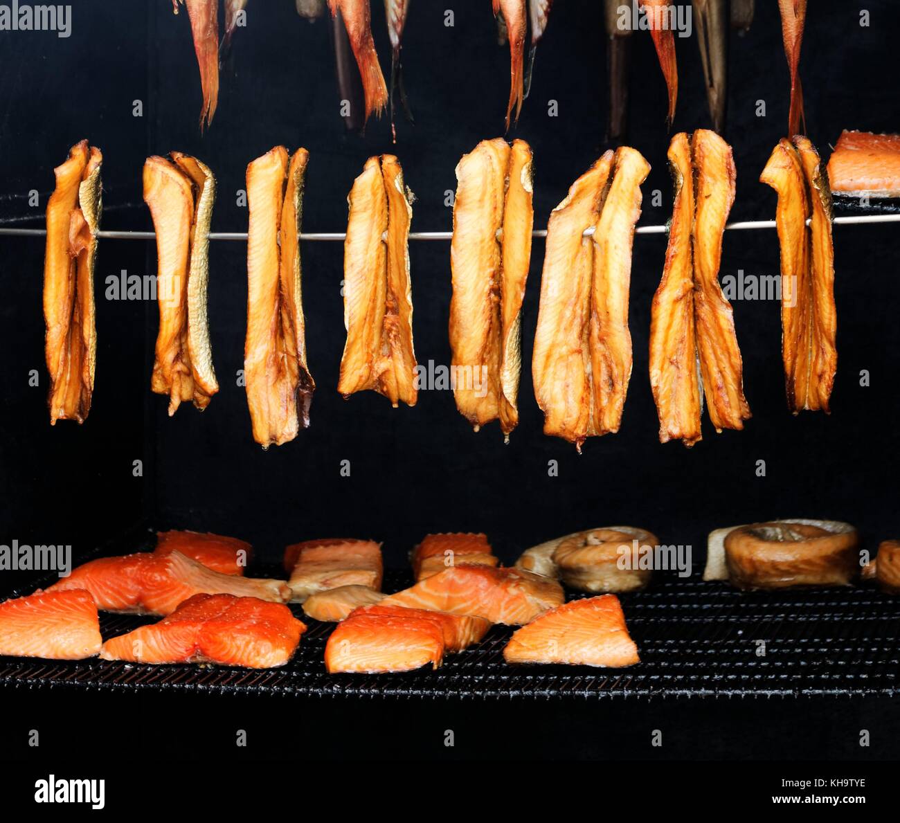 Smoked fish hanging in a smokehouse Stock Photo - Alamy