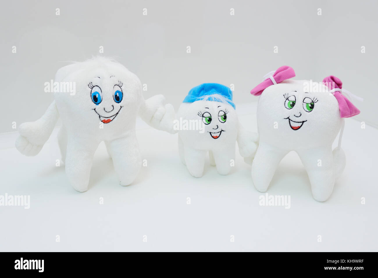 soft toys - a cheerful family of teeth Stock Photo - Alamy