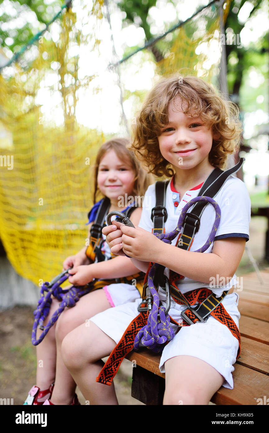 Children in rope park pass hi-res stock photography and images - Alamy