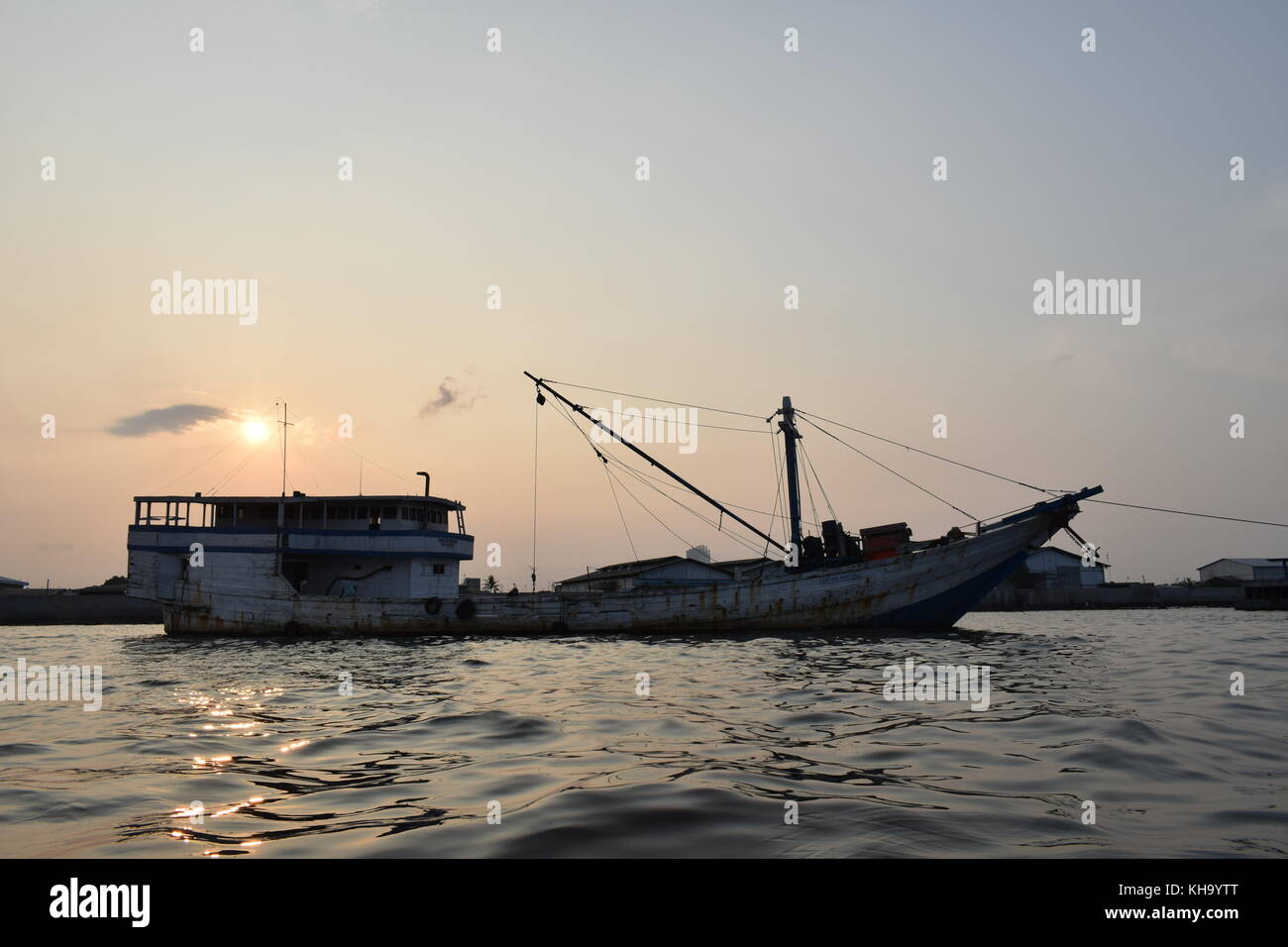 the ship are sail when the sun goes down Stock Photo - Alamy
