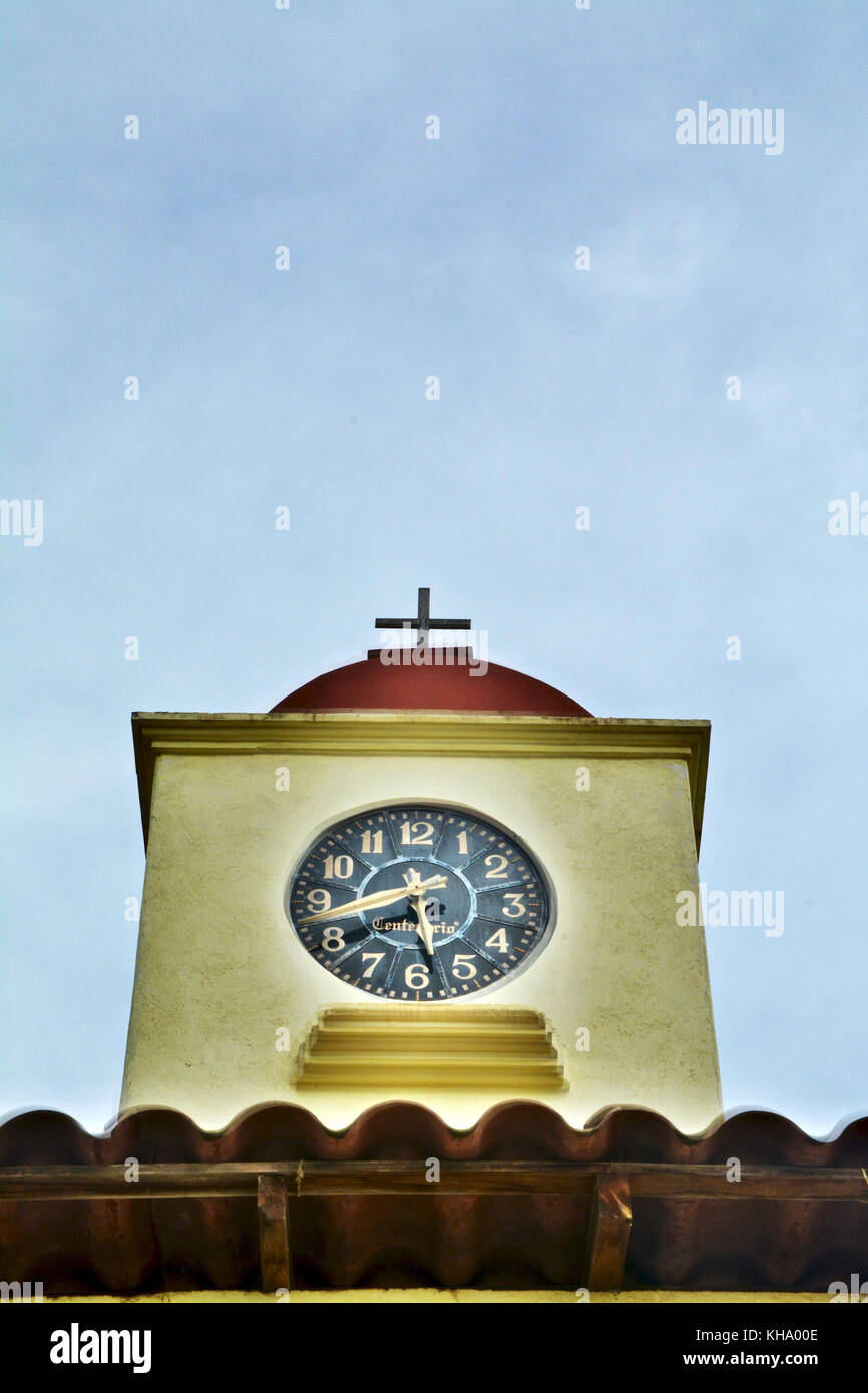 A sacred catholic church clock in Mazunte, Oaxaca Stock Photo - Alamy