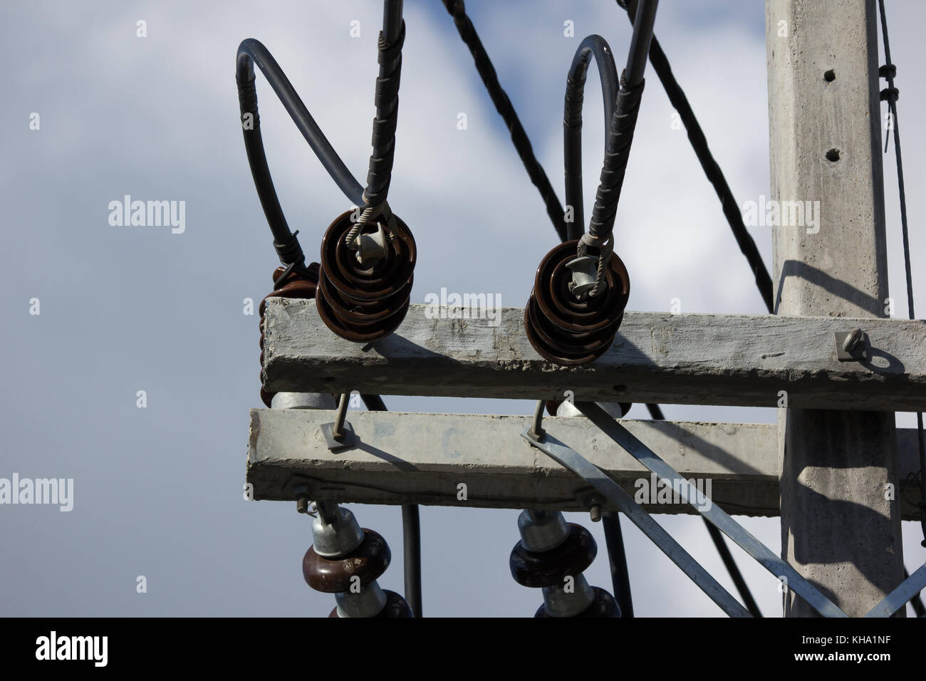 Closeup Eletricity line and electricity post wtih blue sky background ...