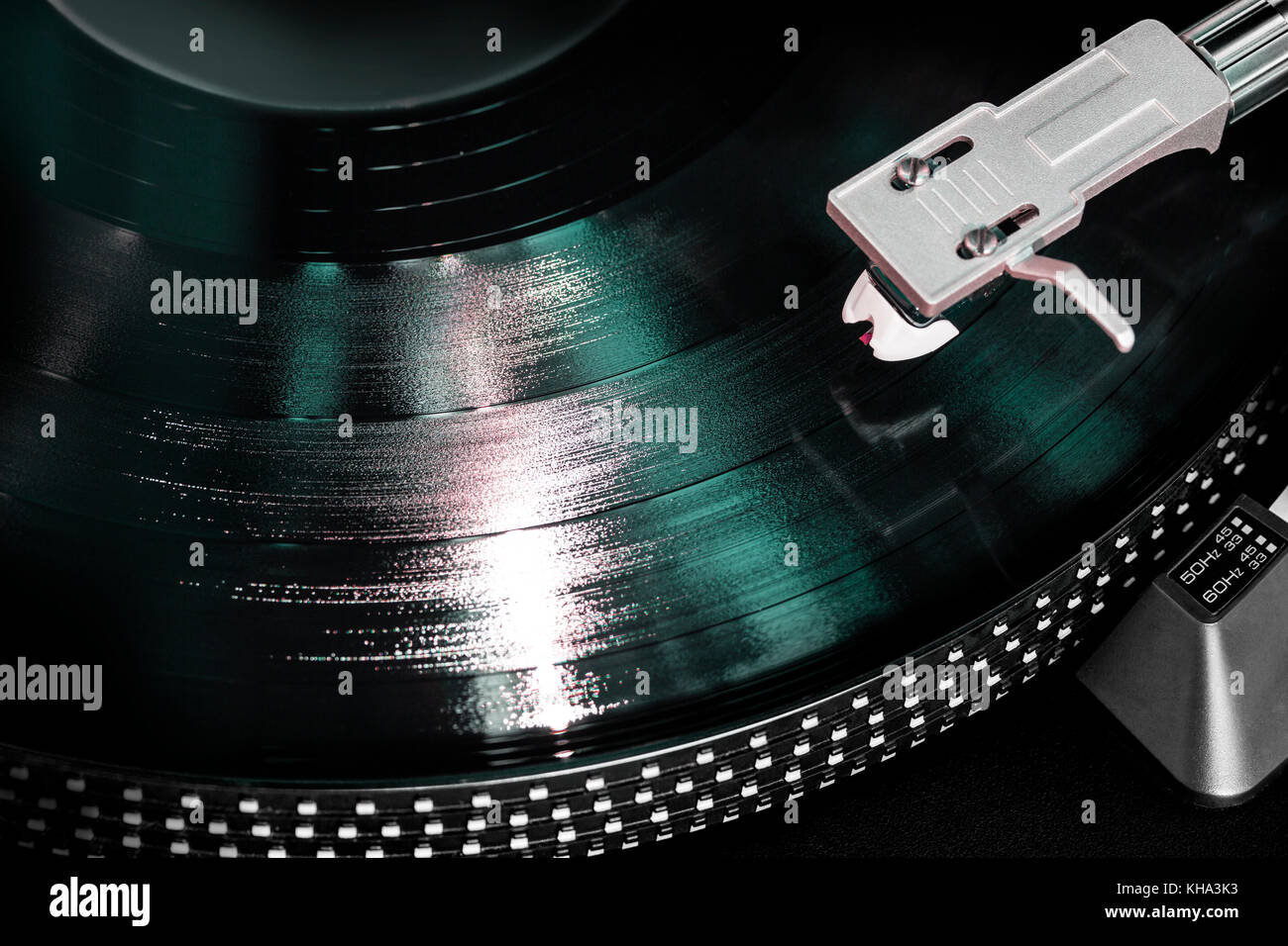 Gramophone with a vinyl record, closeup Stock Photo - Alamy