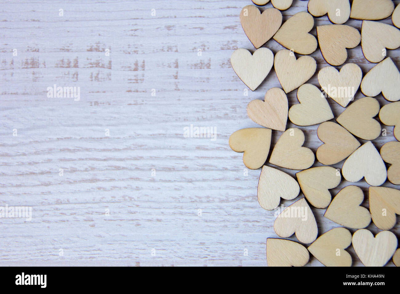 Heart shape from natural tree wooden small hearts on rustic wood table ...