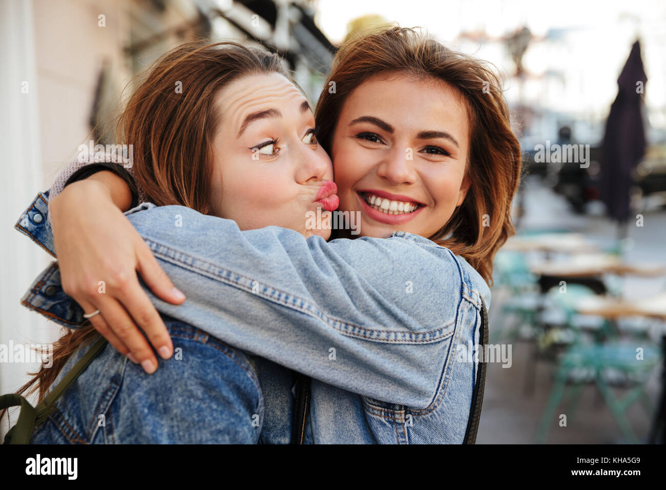 Close up two girls hugging other hi-res stock photography and images ...