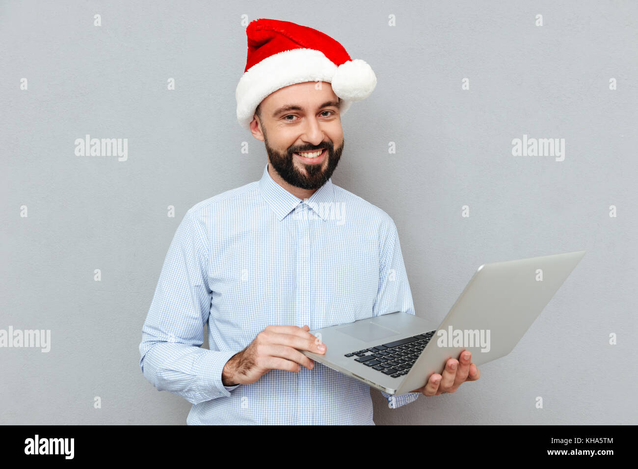 Bearded man laptop smiling camera hi-res stock photography and images ...